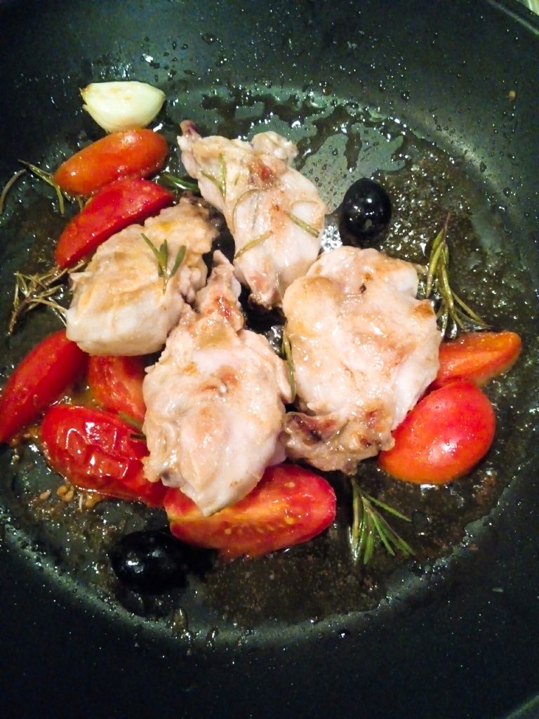 Rabbit with Fresh Cherry Tomatoes and Black Olives in a Pan - Delicious ...