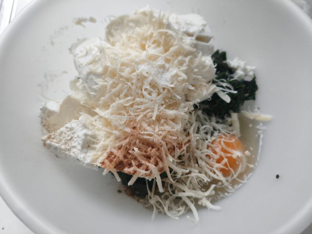 Toscaanse gnudi met ricotta en spinazie met witte ragù - Heerlijke recepten